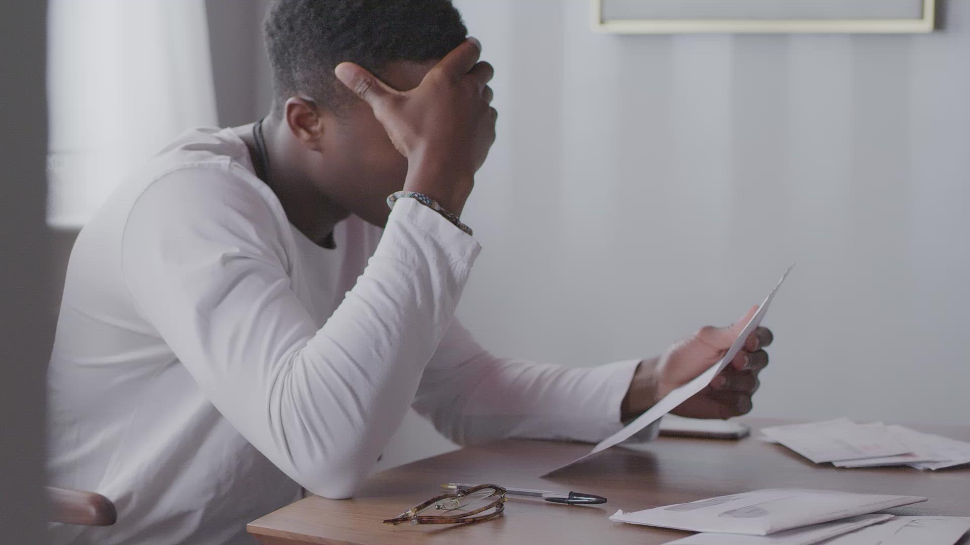 Stressed Student Looking at Bills – FILMPAC