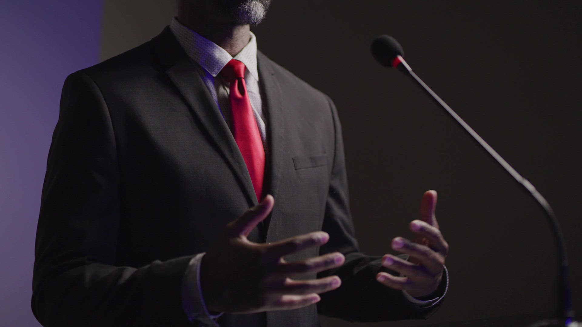 Man Speaking from a Podium – FILMPAC