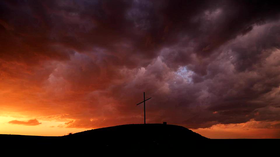 Storm Clouds over a Cross on a Mountain – FILMPAC
